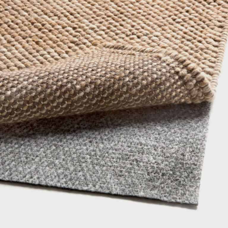 How To Stop Your Rug From Slipping On Carpet (6 Easy Ways)